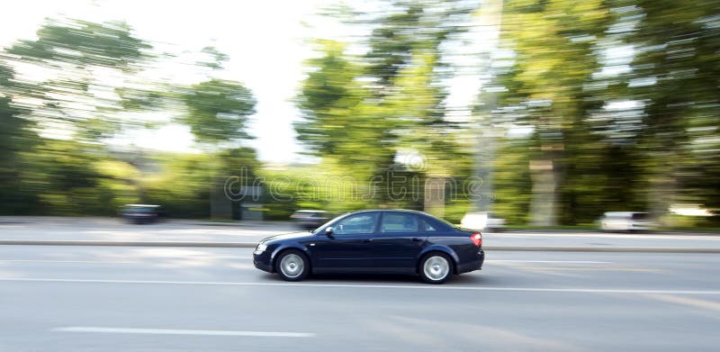 Speeding car (Mini Cooper) stock image. Image of commuting - 14508305