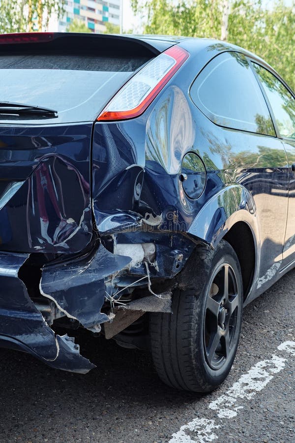 Blue Car with a Broken Rear Hood Stock Photo - Image of injury ...