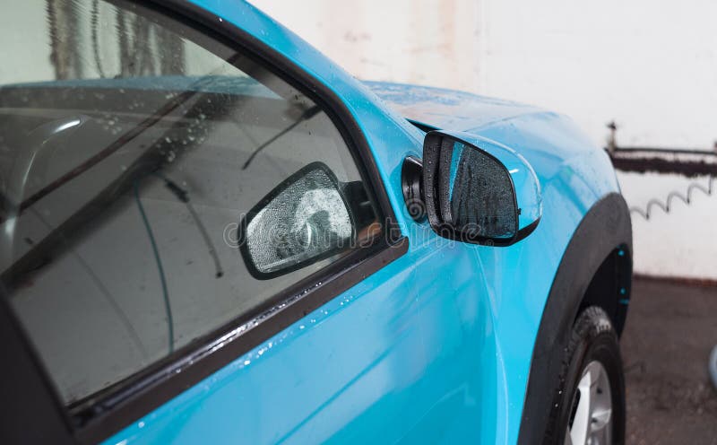 Blue car freshly washed stock image. Image of rainy - 111384925