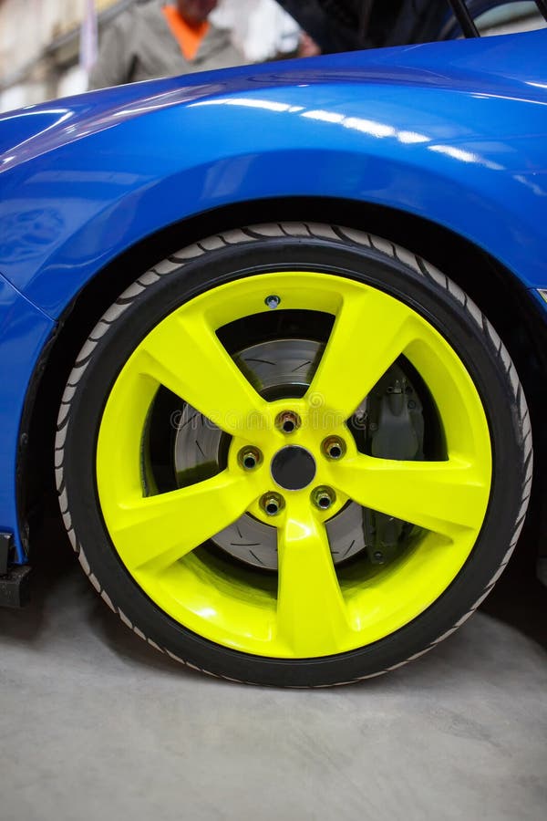 Blue Car with Green Alloy Wheel Indoor Stock Photo - Image of awesome ...