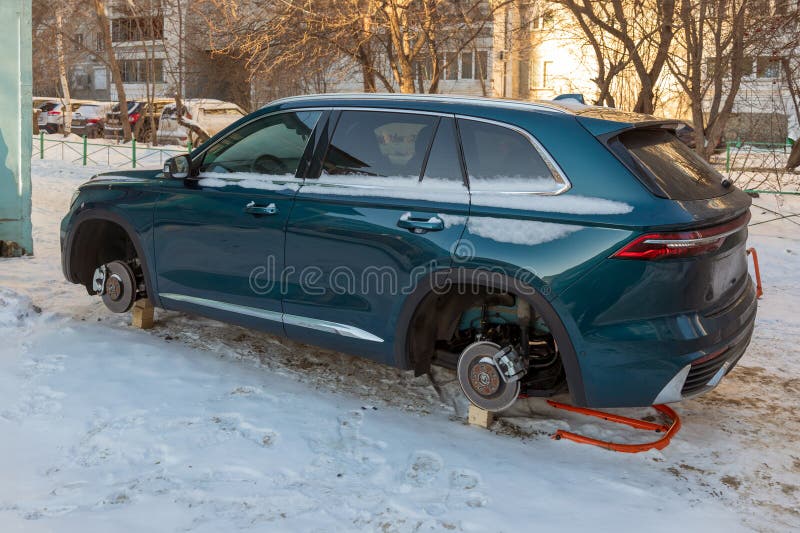 Blue Car with No Wheels is Parked in a Parking Lot Stock Photo - Image ...