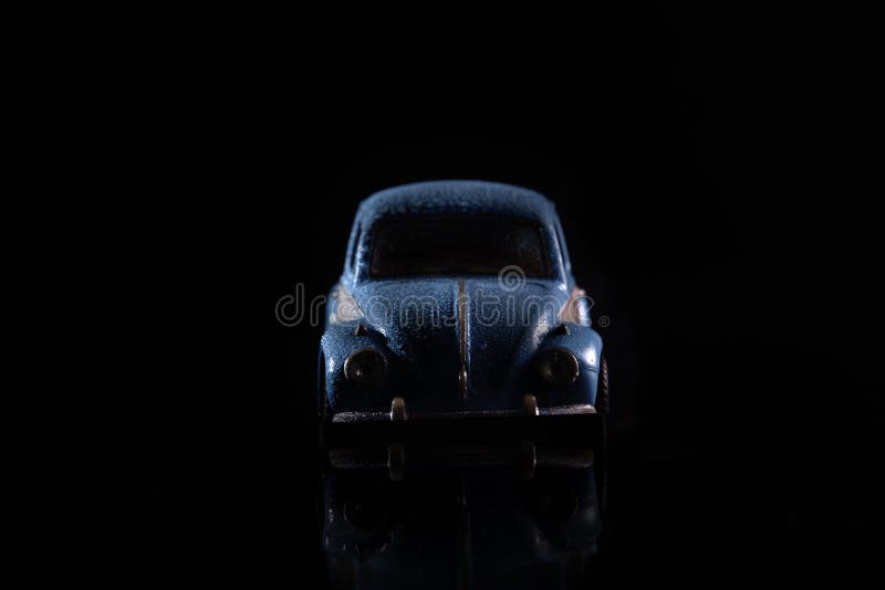 Blue car in the shadows stock image. Image of concept - 217473631