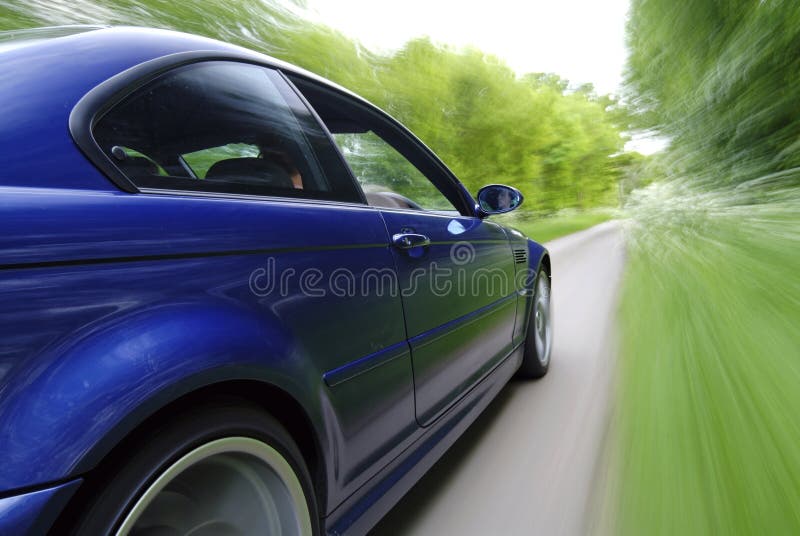 Blue Car Speeding stock photo. Image of transportation - 879568