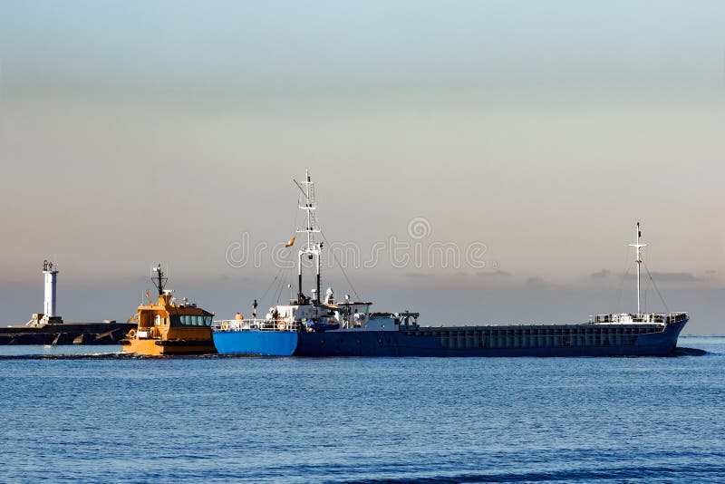 Blue Cargo Ship Leaving Riga Stock Image - Image of ship, orange: 88473889