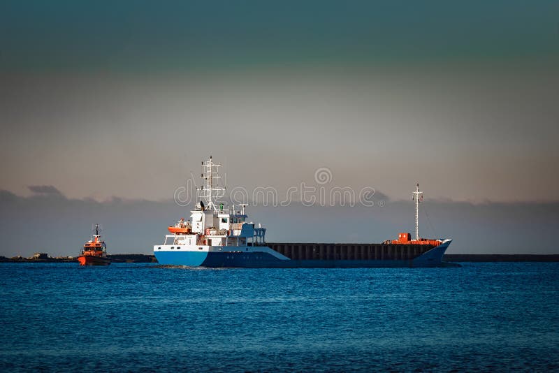 Blue cargo ship stock photo. Image of moving, large, ocean - 88608384