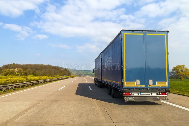 Blue Cargo Truck on an Empty Freeway Stock Photo - Image of business ...