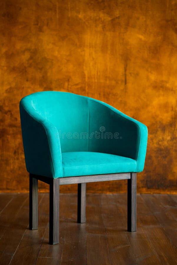 Blue Chair Against a Brown Wall. Interior Stock Photo - Image of ...