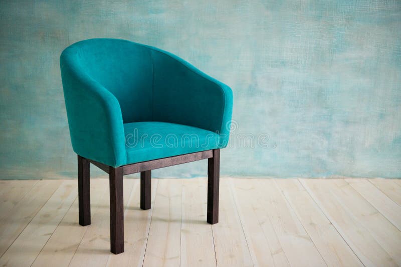 Blue Chair Against the Blue Wall. Interior Stock Image - Image of ...