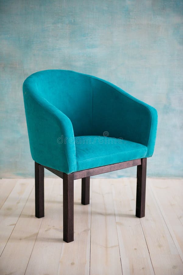 Blue Chair Against the Blue Wall. Interior Stock Photo - Image of ...