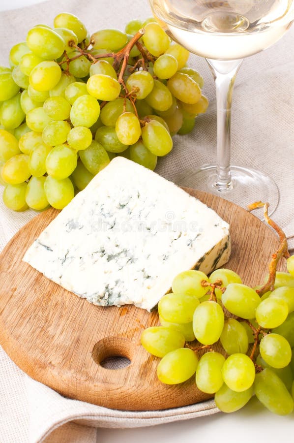 Blue cheese and grapes stock photo. Image of blue, background - 24496910