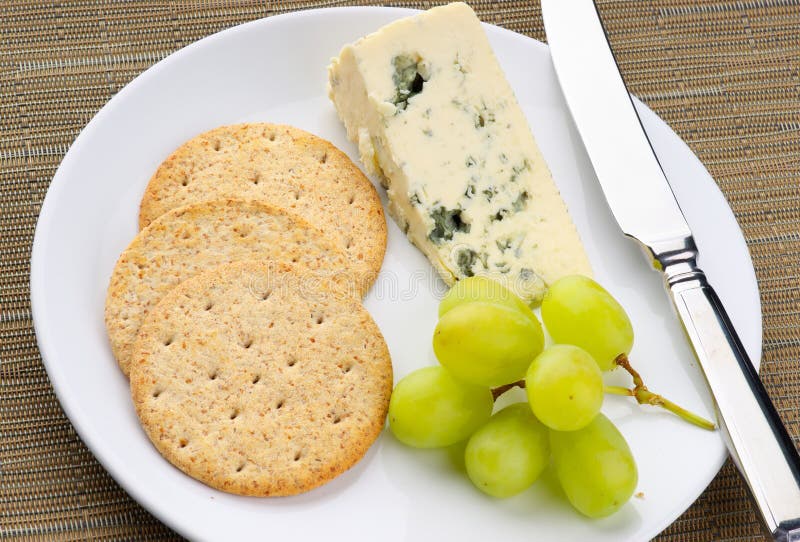 Blue cheese with grapes stock photo. Image of cheese, snack - 8166856