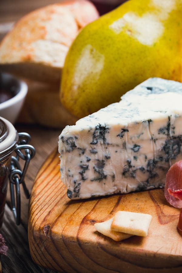 Blue Cheese with Pear on Wooden Board Stock Photo - Image of piece ...