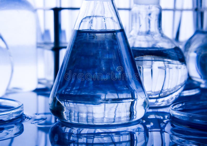 Blue chemistry vials stock image. Image of container, biology - 3955649