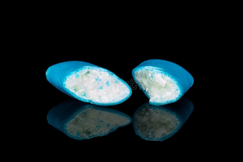 Blue Chewing Gum Isolated on Black Glass Stock Photo - Image of covered ...