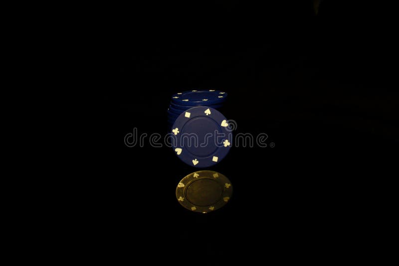 Blue Chips Stack with a Blue Chip in Front Isolated on Black with ...