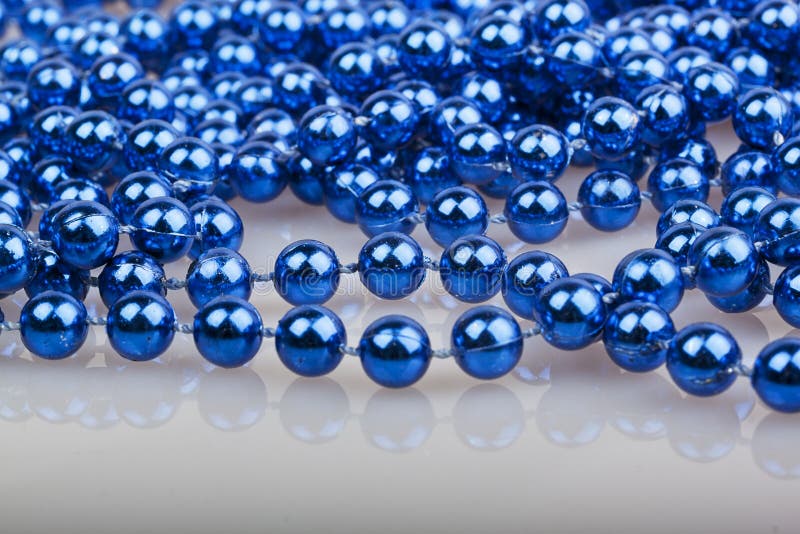 Blue christmas beads stock photo. Image of elegance, beads - 35737442
