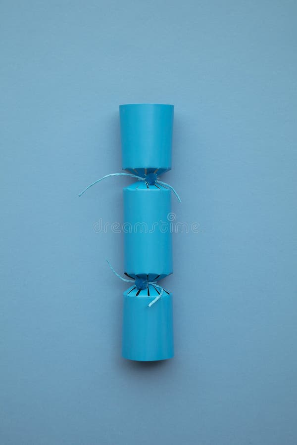 Blue Christmas Cracker on a Blue Background Stock Photo - Image of ...