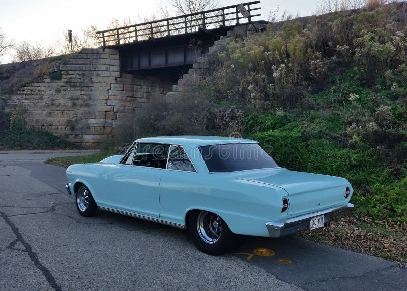 Blue Classic Car Parked by Bridge on Fall Day Editorial Image - Image ...
