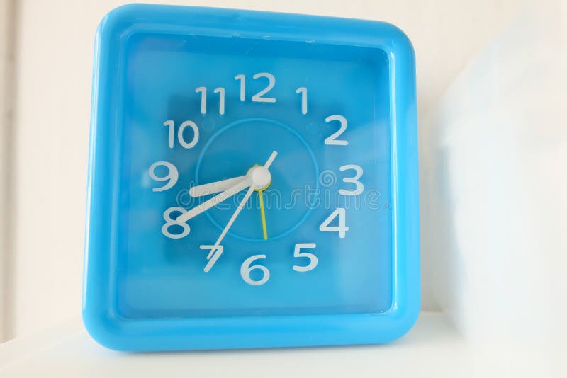 Blue clock in white stock photo. Image of speed, chronometer - 90345232