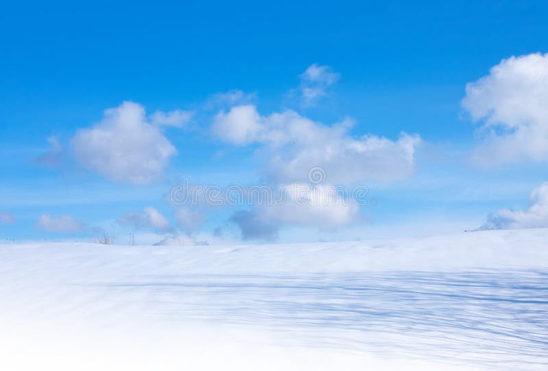 Blue cloudy sky and snow stock image. Image of field - 32690977