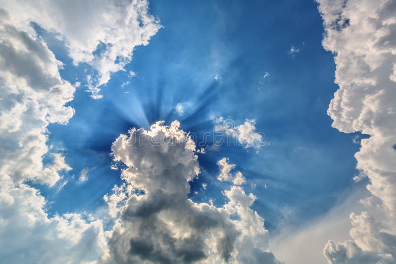 Blue Cloudy Sky with Sun Rays Stock Photo - Image of sunbeam, outdoor ...