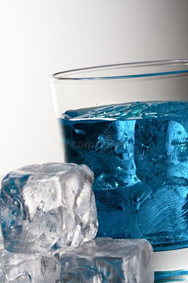 Blue cocktail stock photo. Image of cube, beverage, reflection - 22500400