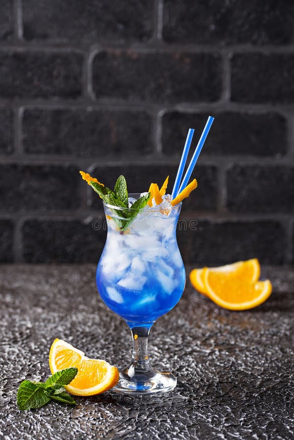 Blue Cocktail Drink with Ice and Orange Stock Image - Image of lime ...