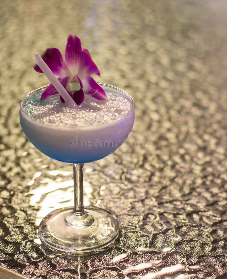 Blue cocktail in glass stock image. Image of alcoholic - 76784159