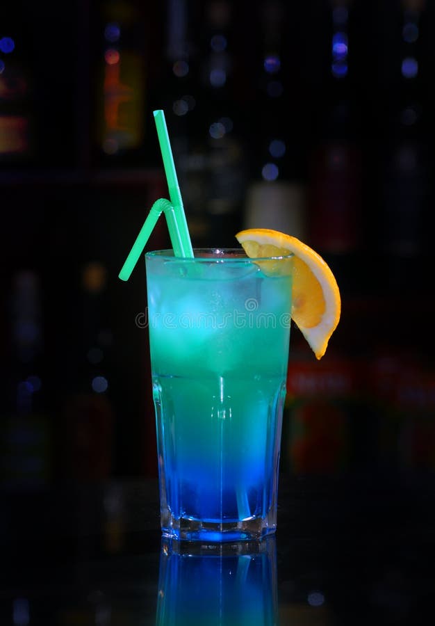 Blue cocktail with a lemon stock photo. Image of tubules - 8056762