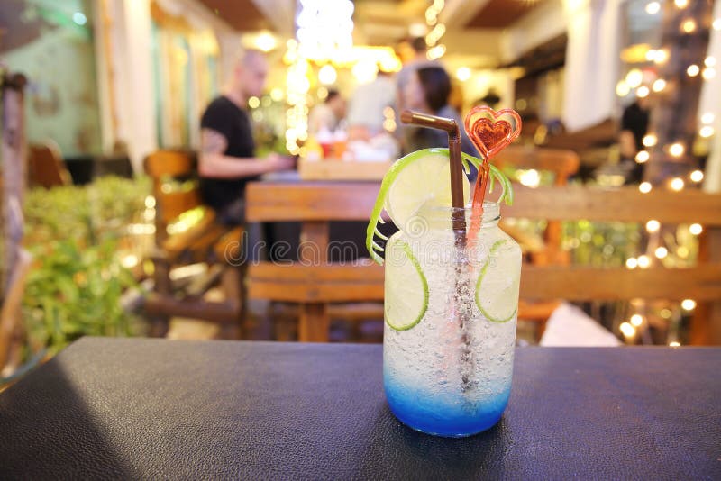 Blue cocktail with lime stock image. Image of food, life - 136984639