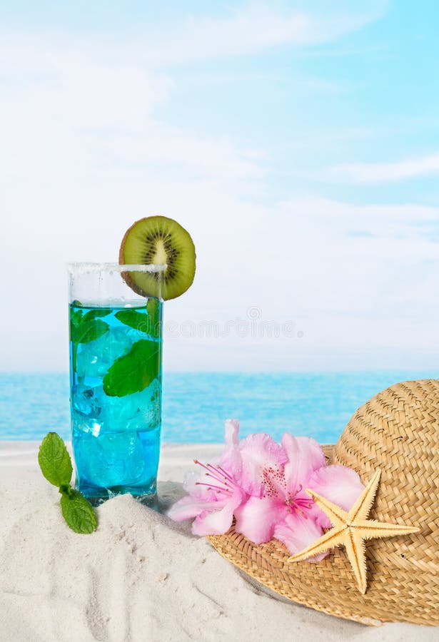 Blue Cocktail and Sandy Beach Stock Image - Image of shore, cocktail ...
