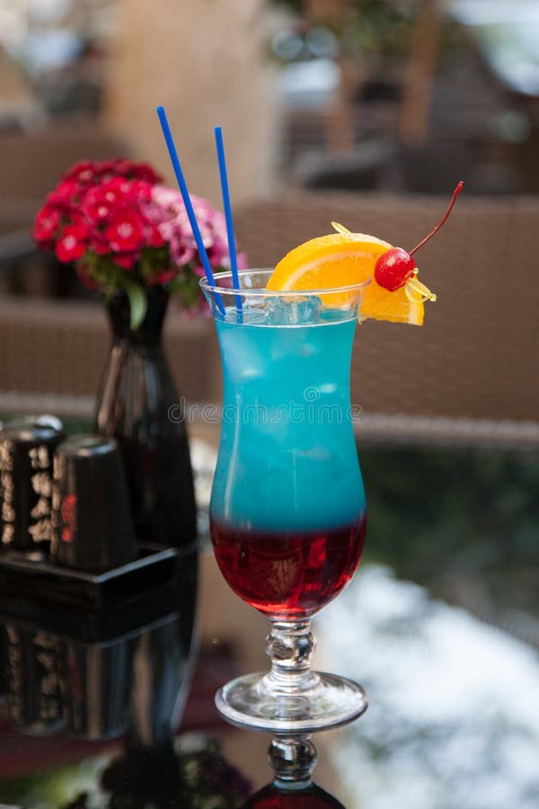 Blue cocktail on table stock image. Image of frozen, glass - 30432073