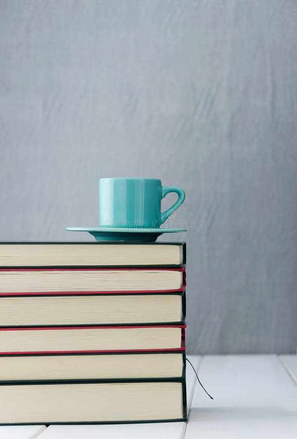 Blue Coffee Cup on Stack of Books Stock Image - Image of color, coffee ...
