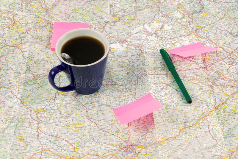 Blue Coffee Mug and Paper with Ballpoint on Map, Preparation for Travel ...