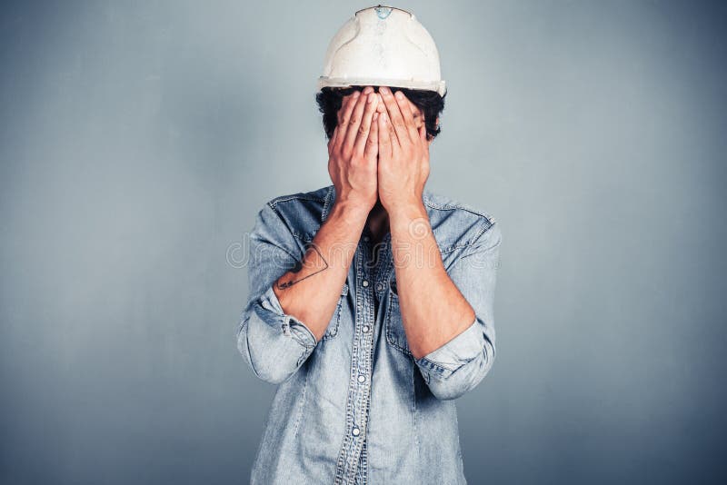 Blue Collar Worker Covering His Face Stock Photo - Image of occupation ...
