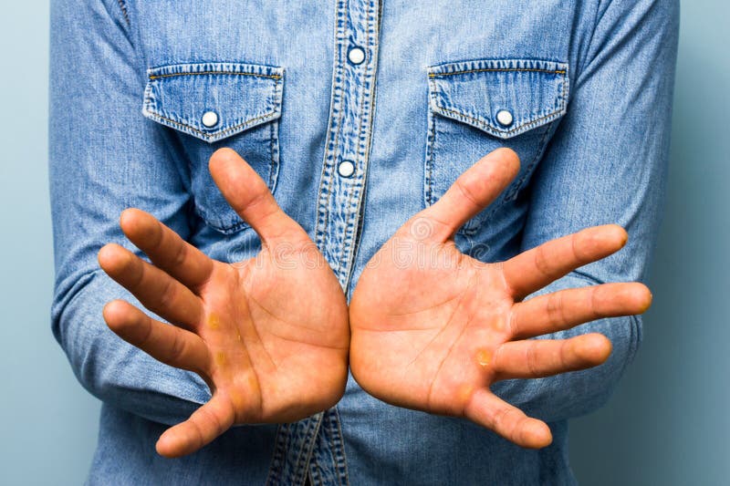 Blue Collar Worker with Hands Folded Stock Photo - Image of denim, blue ...