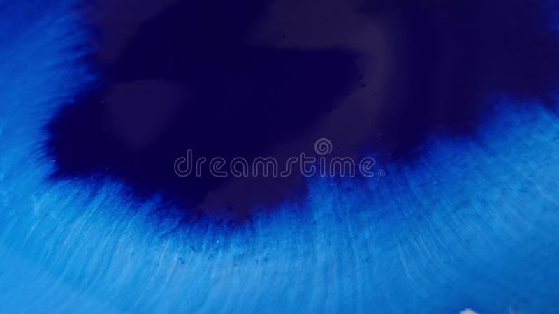 Blue Color Inks Spreading Out Over Wet Paper Background. Stock Footage ...