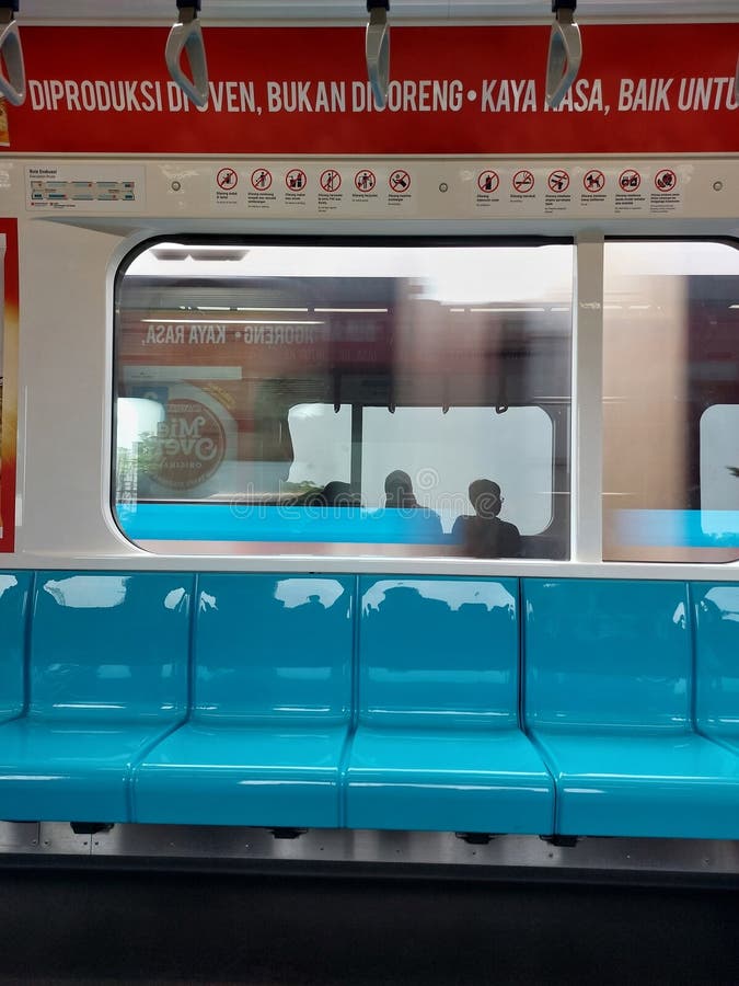The Blue Color of the Passenger Seats and the Red Color of the ...