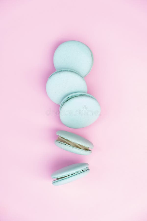 Blue Color Pastry Macarons Top View on a Pink Background Stock Image ...
