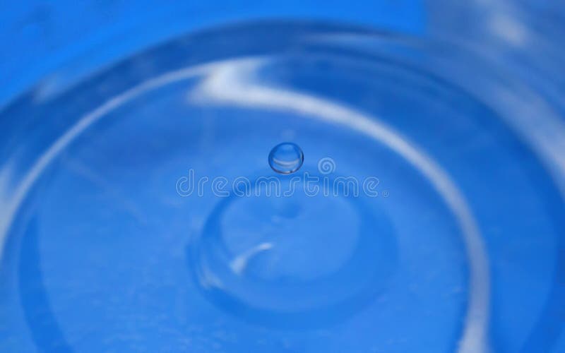 Blue Color Water Drop Splash. Falling Drop of Water Stock Photo - Image ...