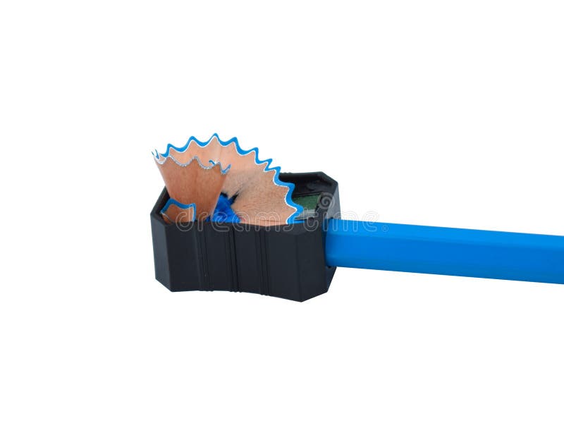 Blue Color Wood Pencil Crayon Placed Inside a Pencil Sharpener and Some ...