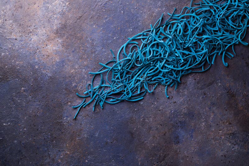 Blue Colored Pasta on Dark Background Concept. Flat Lay. Copy Space ...