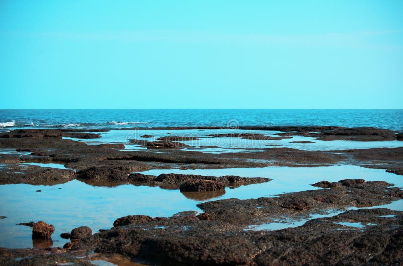 Tidal Rock Pool Surrounded by Smooth Rocks and Seaweed,Dollar Cove ...