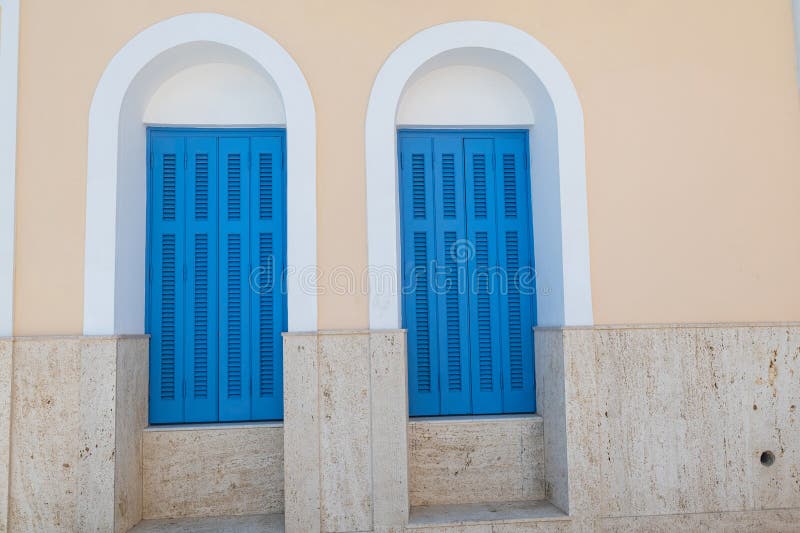 Blue Coloured Windows of an Old House Stock Image - Image of people ...