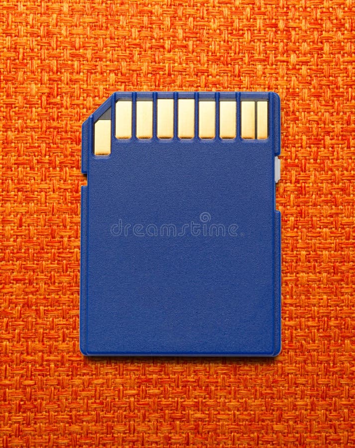 A Compact SD Memory Card Lies on a White Netbook. the Digital ...