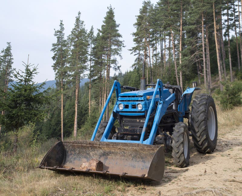 Blue Compact Tractor with Open Operator Station Stock Photo - Image of ...