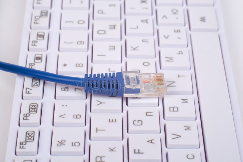 Blue Computer Cable on Keyboard Stock Image - Image of technology ...