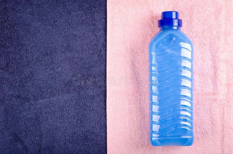 Blue Conditioner in Bottle on Textile Composition Stock Photo - Image ...