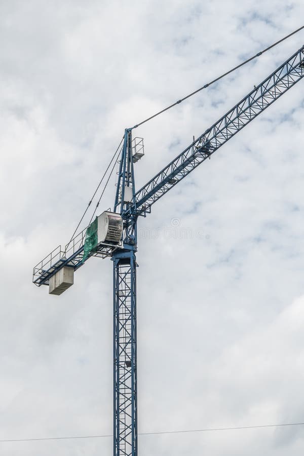 Blue construction crane stock image. Image of building - 75962707