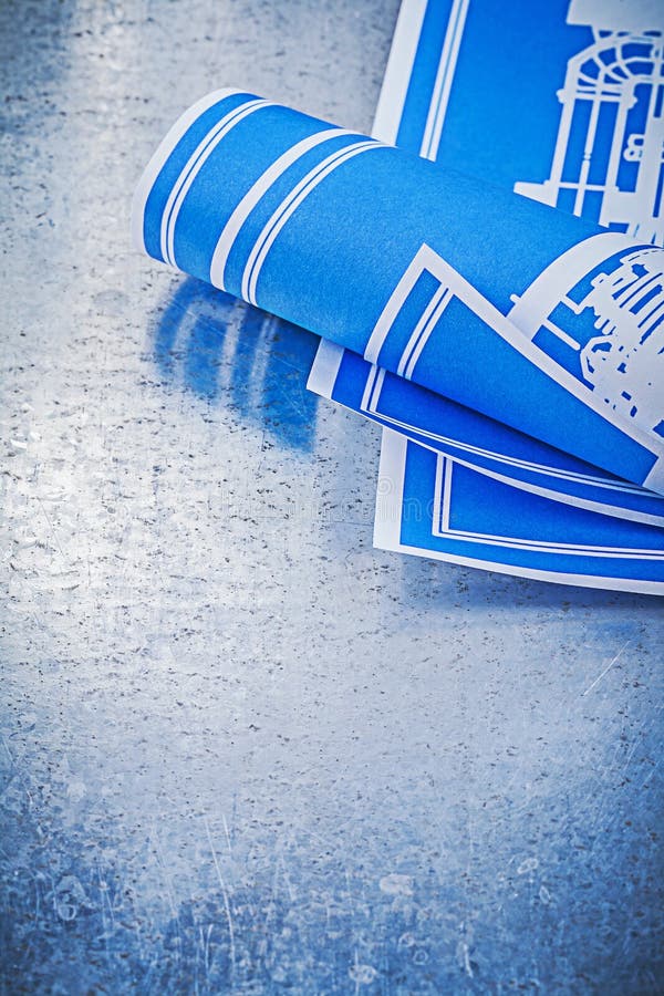 Blue Construction Drawings on Scratched Metallic Background Stock Image ...